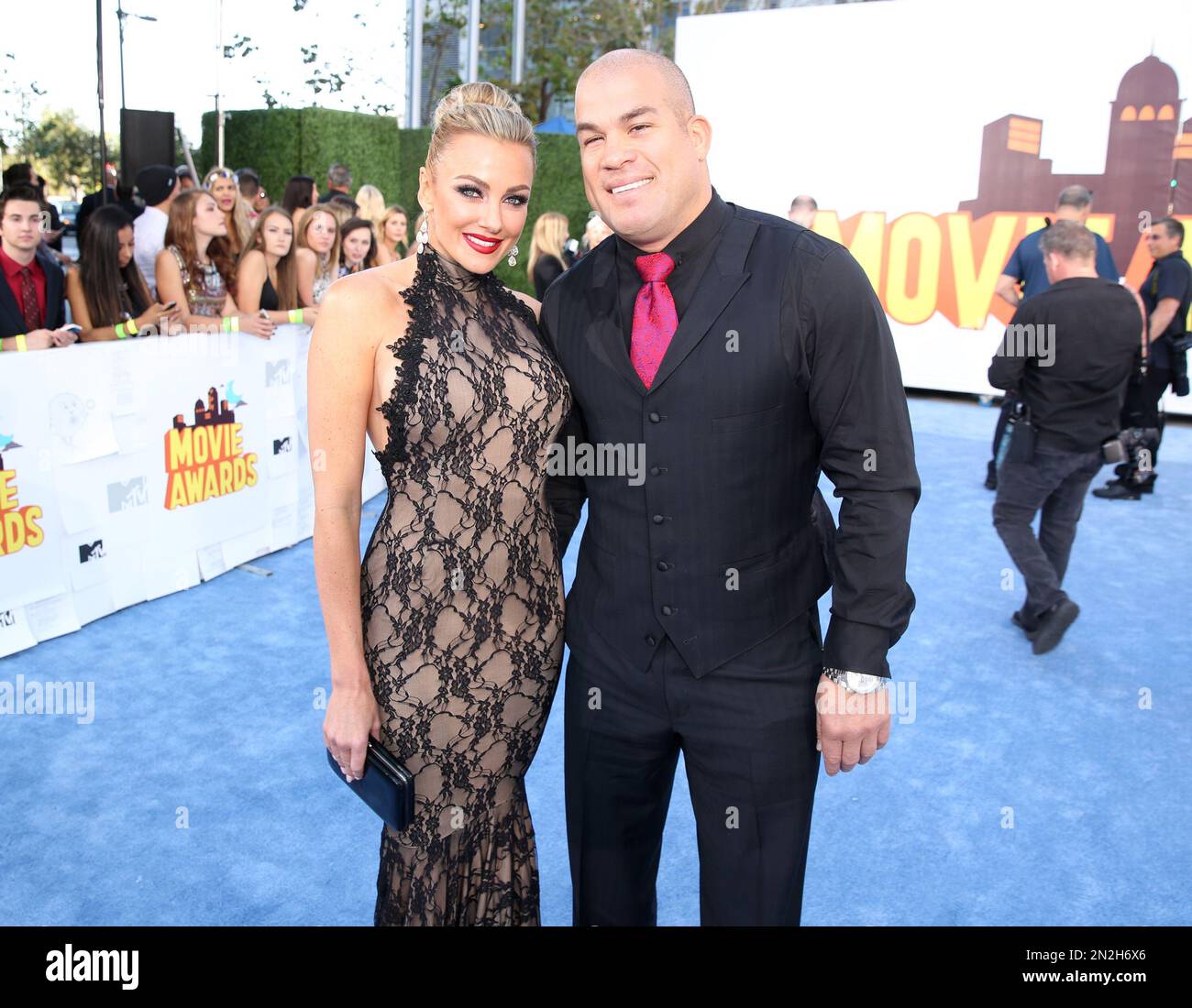 Amber Nichole Miller, left, and Tito Ortiz arrive at the MTV Movie ...