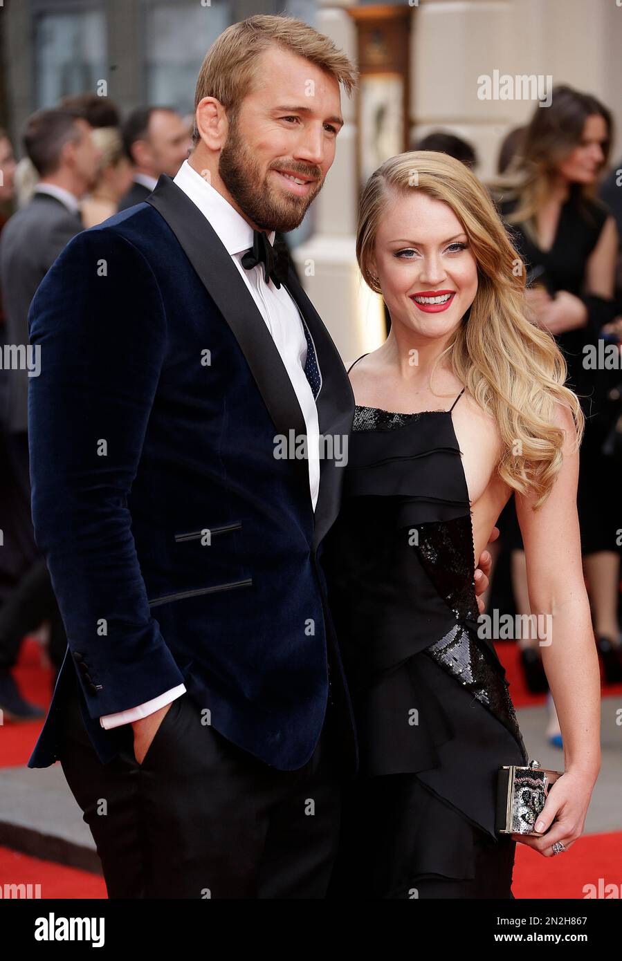Camilla Kerslake and Chris Robshaw pose for photographers upon arrival ...