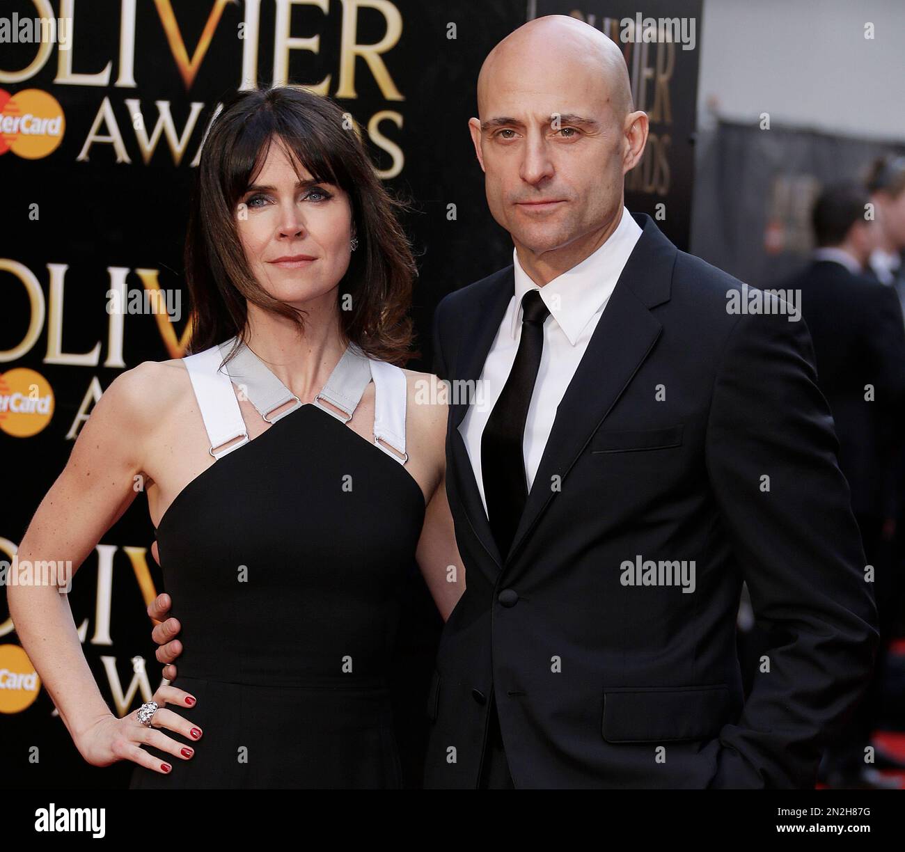 Actor Mark Strong and wife Liza Marshall pose for photographers upon ...