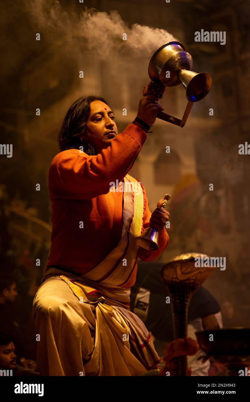 Ganga Aarti, Hindu priest conducts religious Ganga Aarti ritual (fire ...