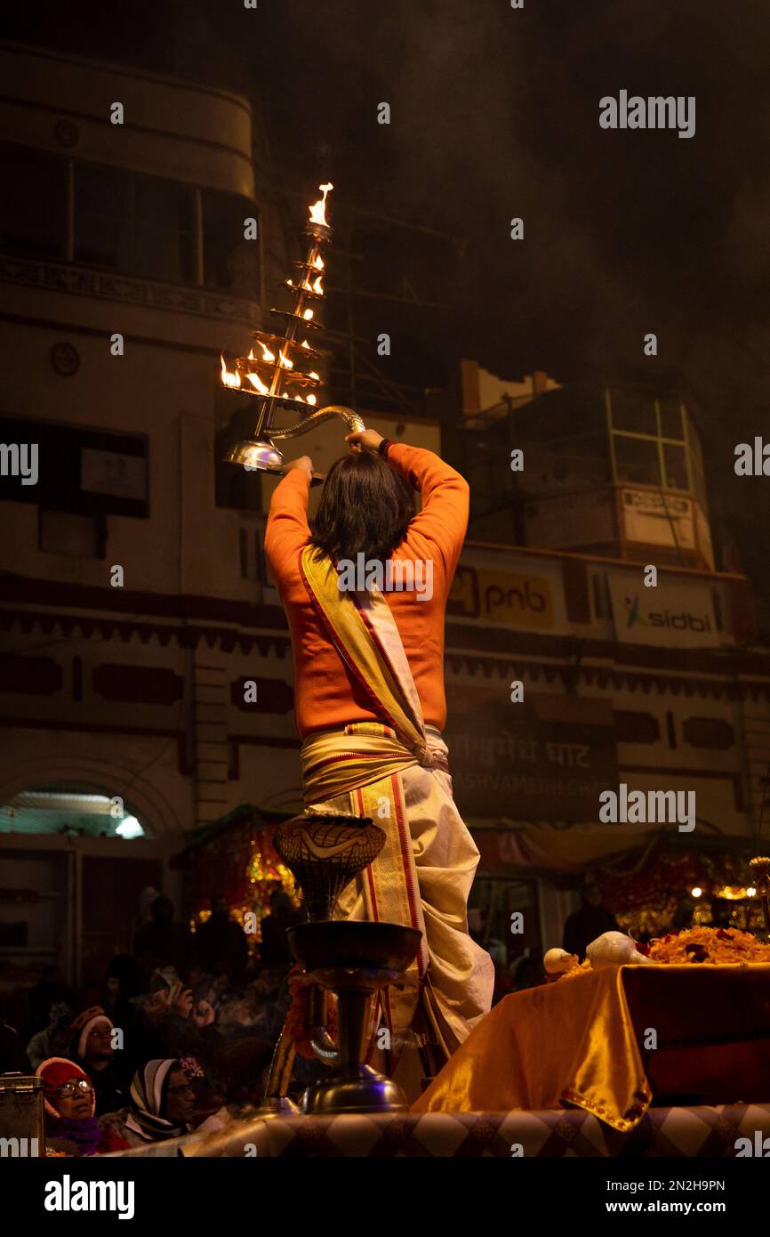 Ganga Aarti, Hindu priest conducts religious Ganga Aarti ritual (fire ...