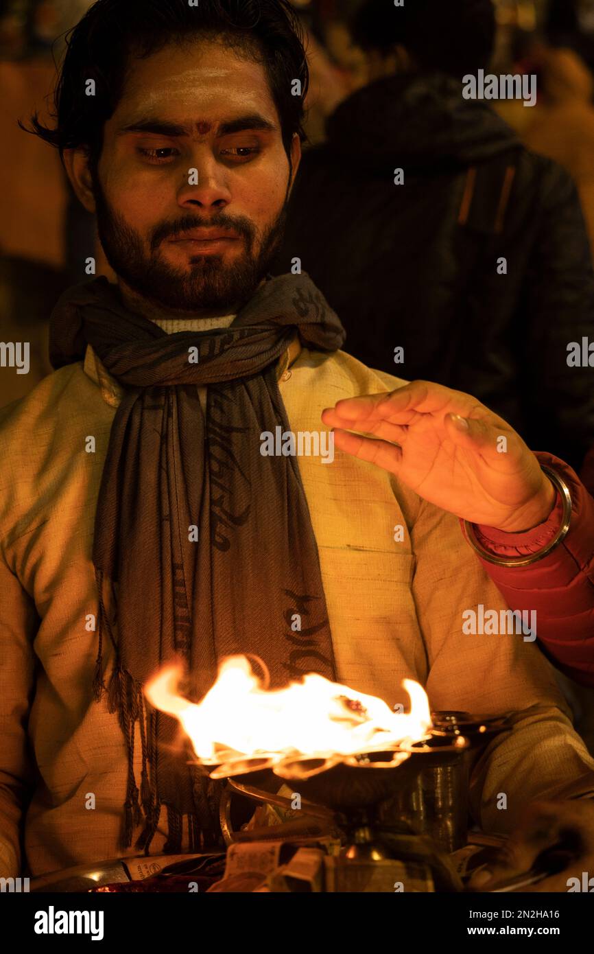 Ganga Aarti, Hindu priest conducts religious Ganga Aarti ritual (fire ...
