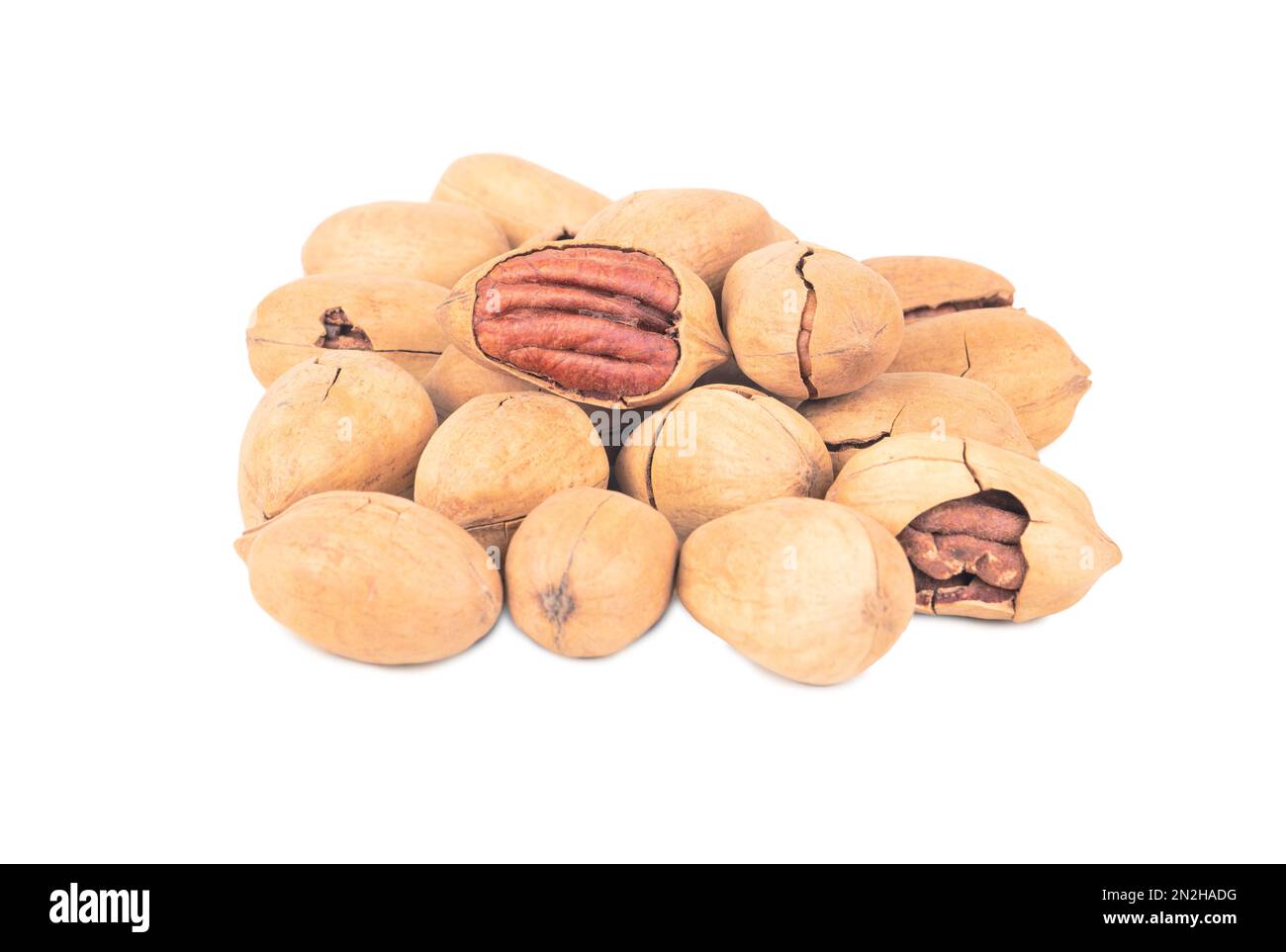 Bunch of inshell pecans on white background Stock Photo - Alamy