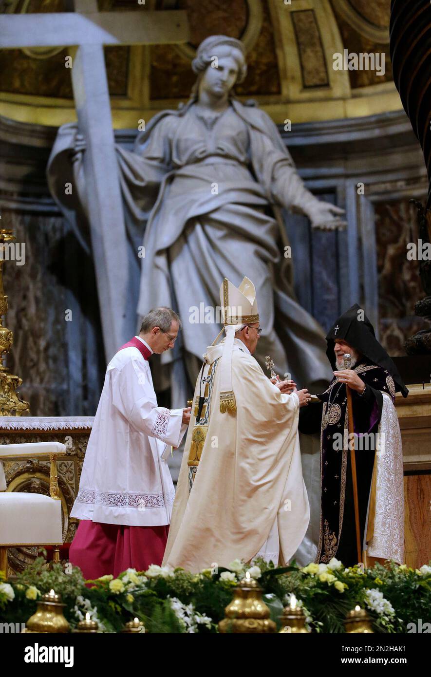 Pope Francis, center, is greeted by the head of Armenia's Orthodox ...