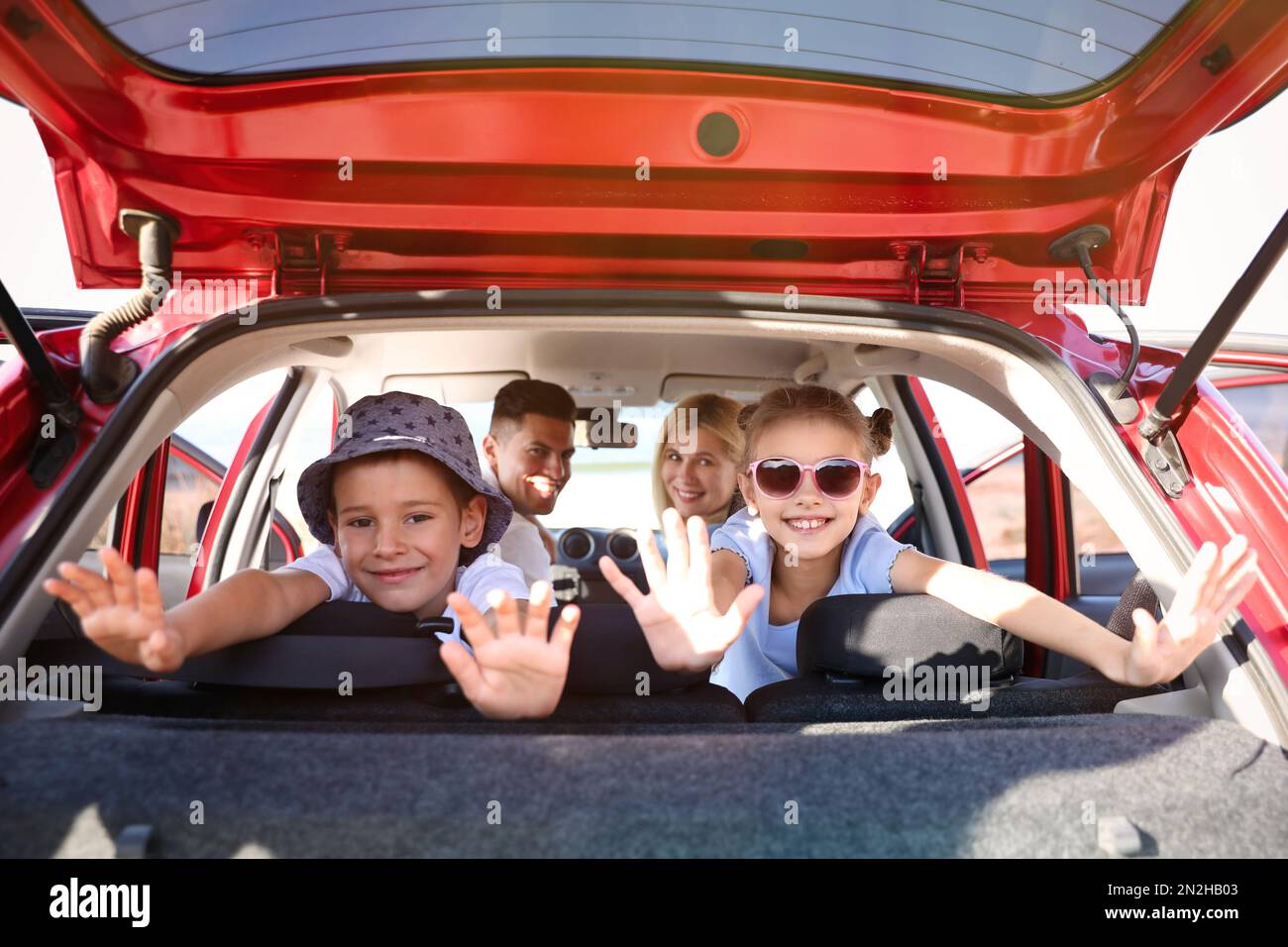Happy family in car hi-res stock photography and images - Alamy