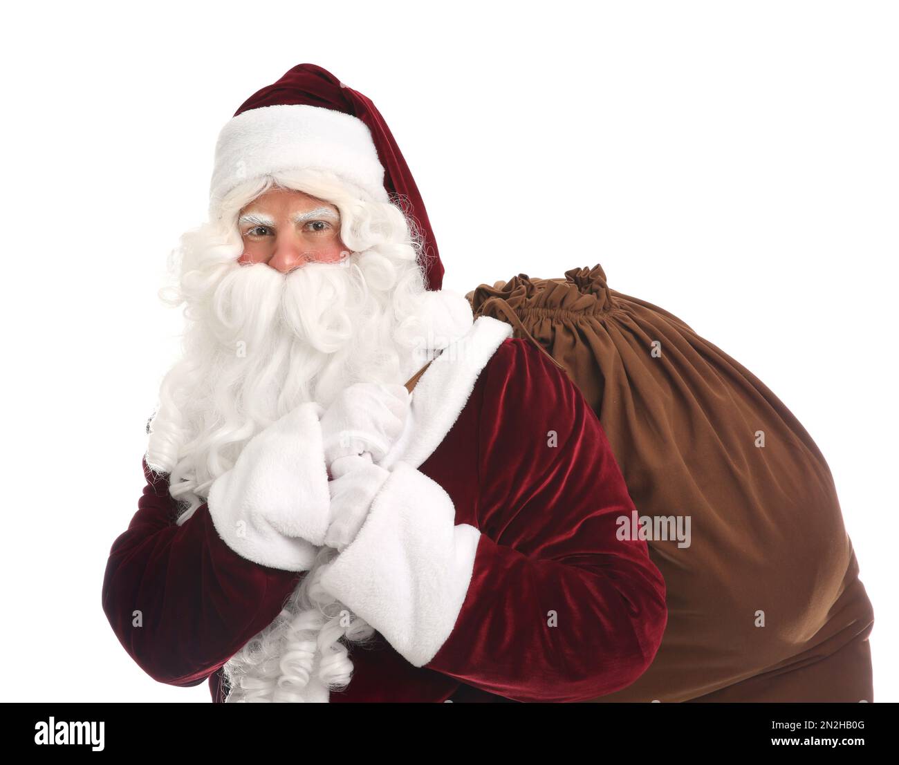 Santa Claus with sack on white background Stock Photo - Alamy