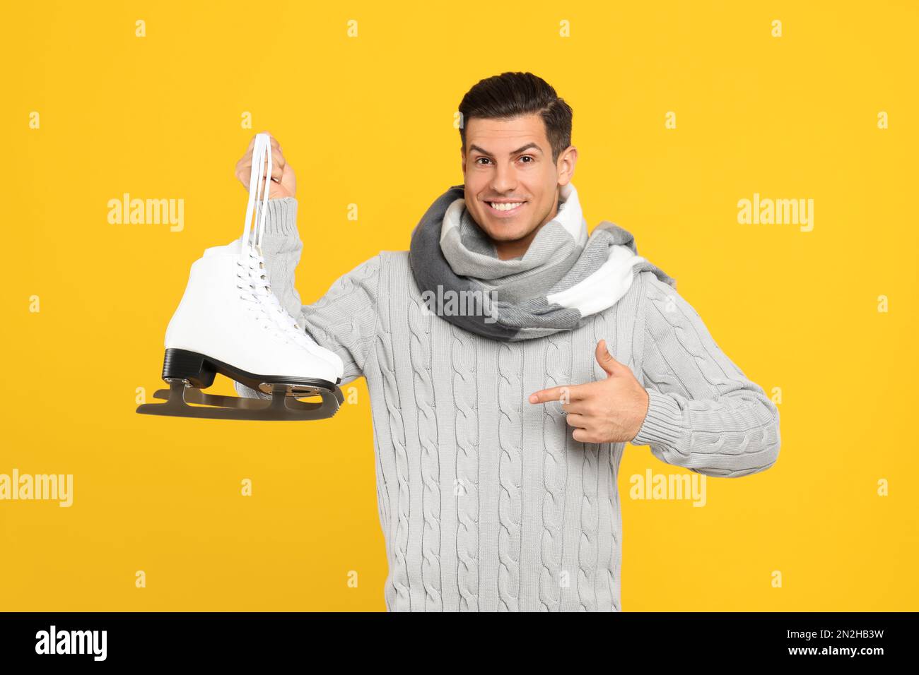 Yellow ice skates hi-res stock photography and images - Alamy