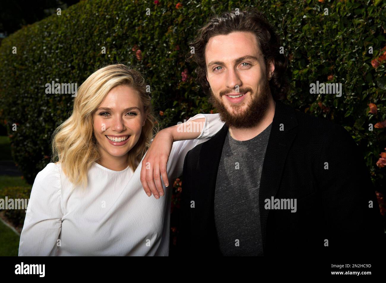 Elizabeth Olsen And Aaron Taylor Johnson Elizabeth Olsen, Left, And
