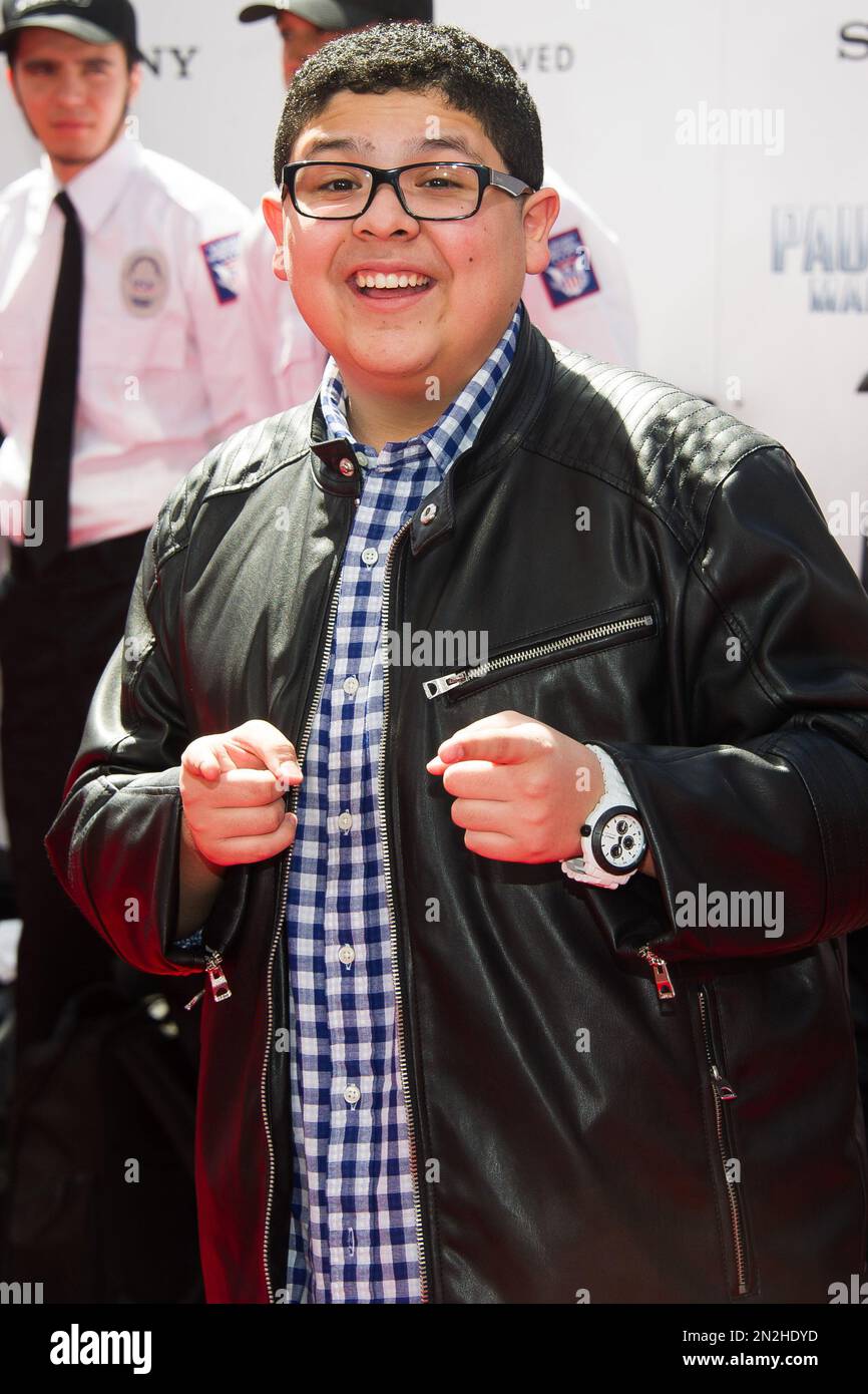 Rico Rodriguez arrives on a Segway to the premiere of "Paul Blart: Mall ...