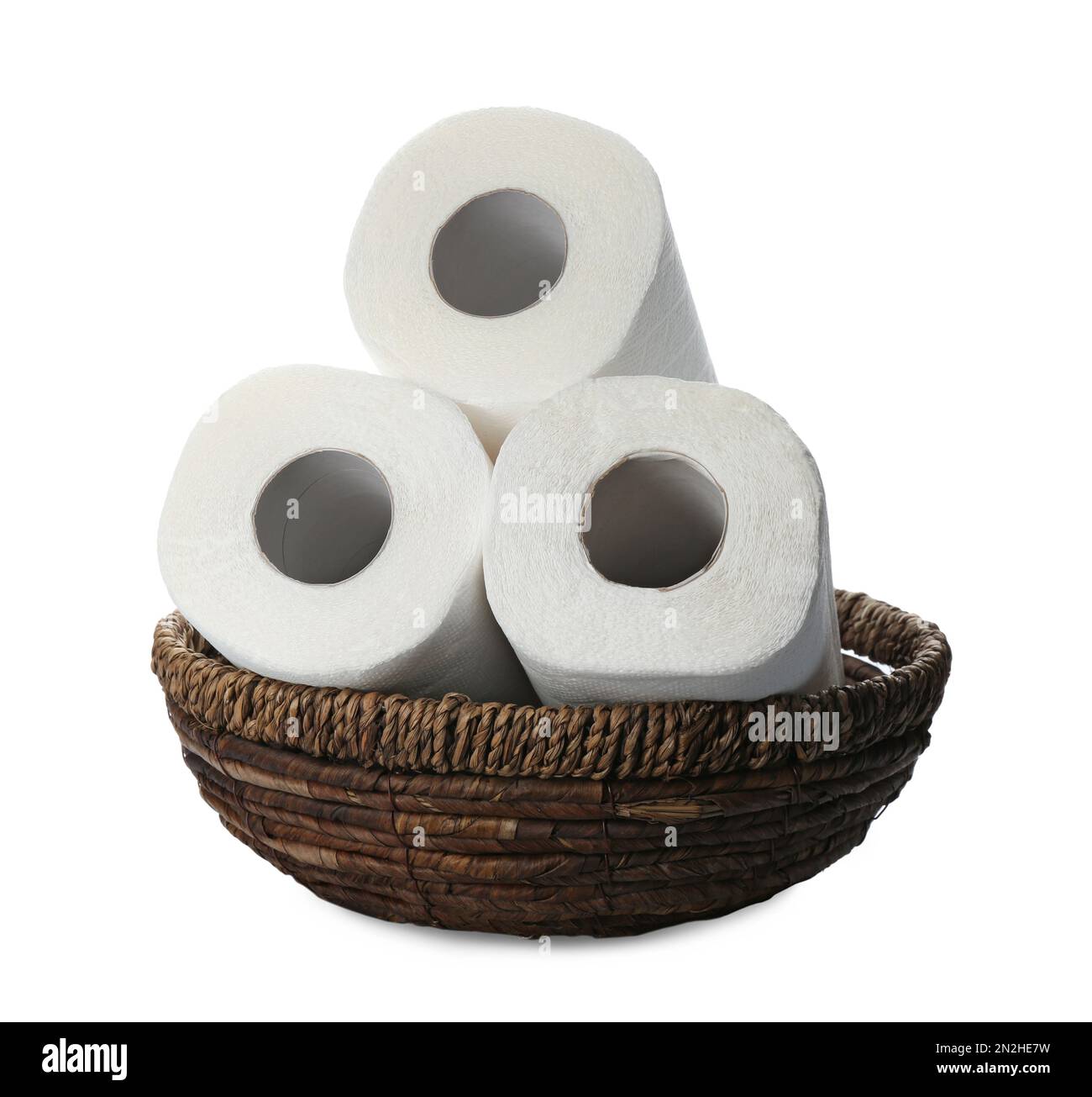 Rolls of paper tissues in basket on white background Stock Photo - Alamy