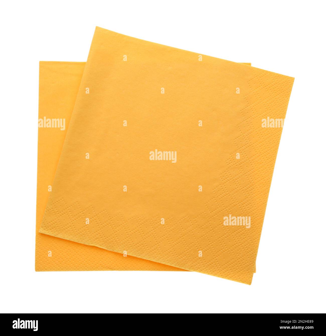 Yellow clean paper tissues on white background, top view Stock Photo ...
