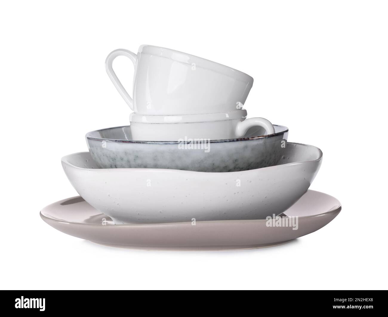 Set of clean tableware isolated on white Stock Photo - Alamy