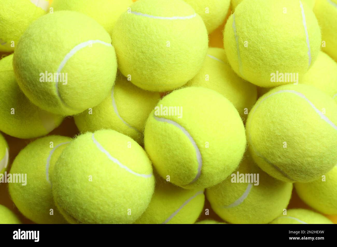 Bright tennis balls, top view. Sports equipment Stock Photo - Alamy