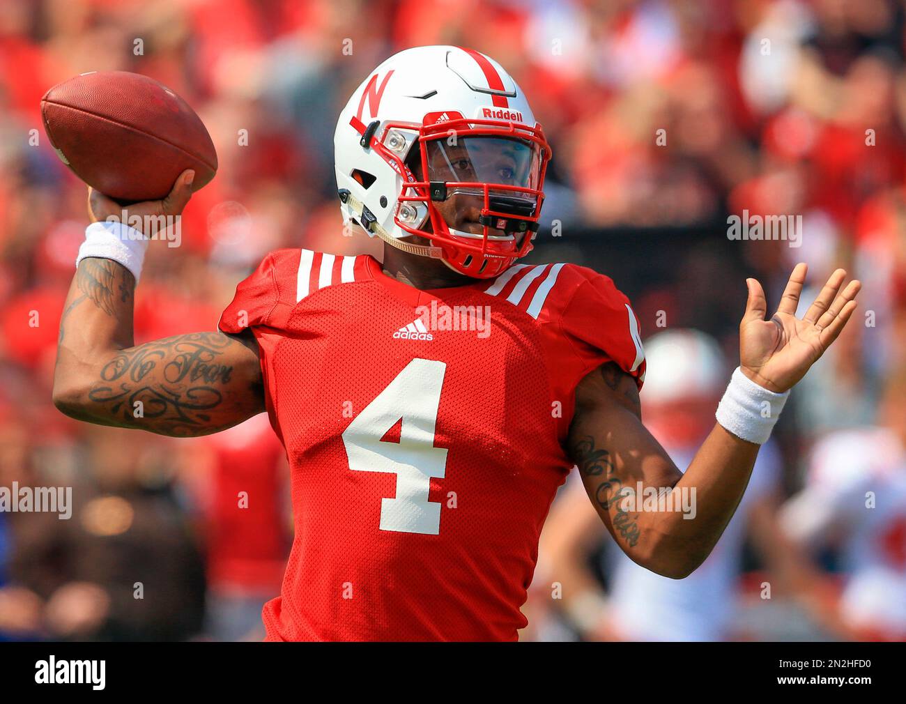 Red Team quarterback Tommy Armstrong Jr. (4) throws during Nebraska's ...