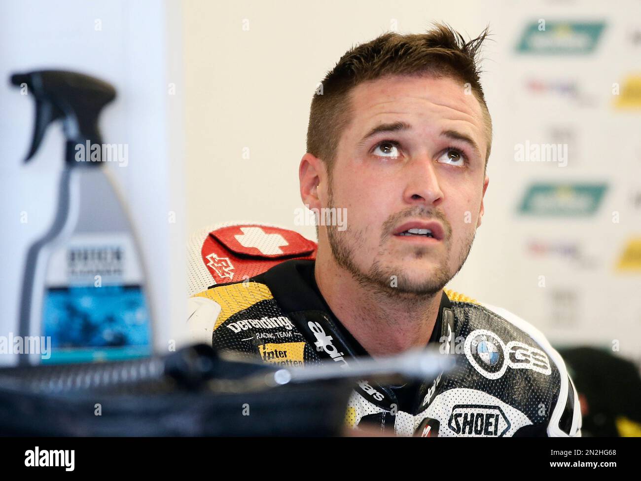 Thomas Luthi of Switzerland looks up a a television monitor in the ...