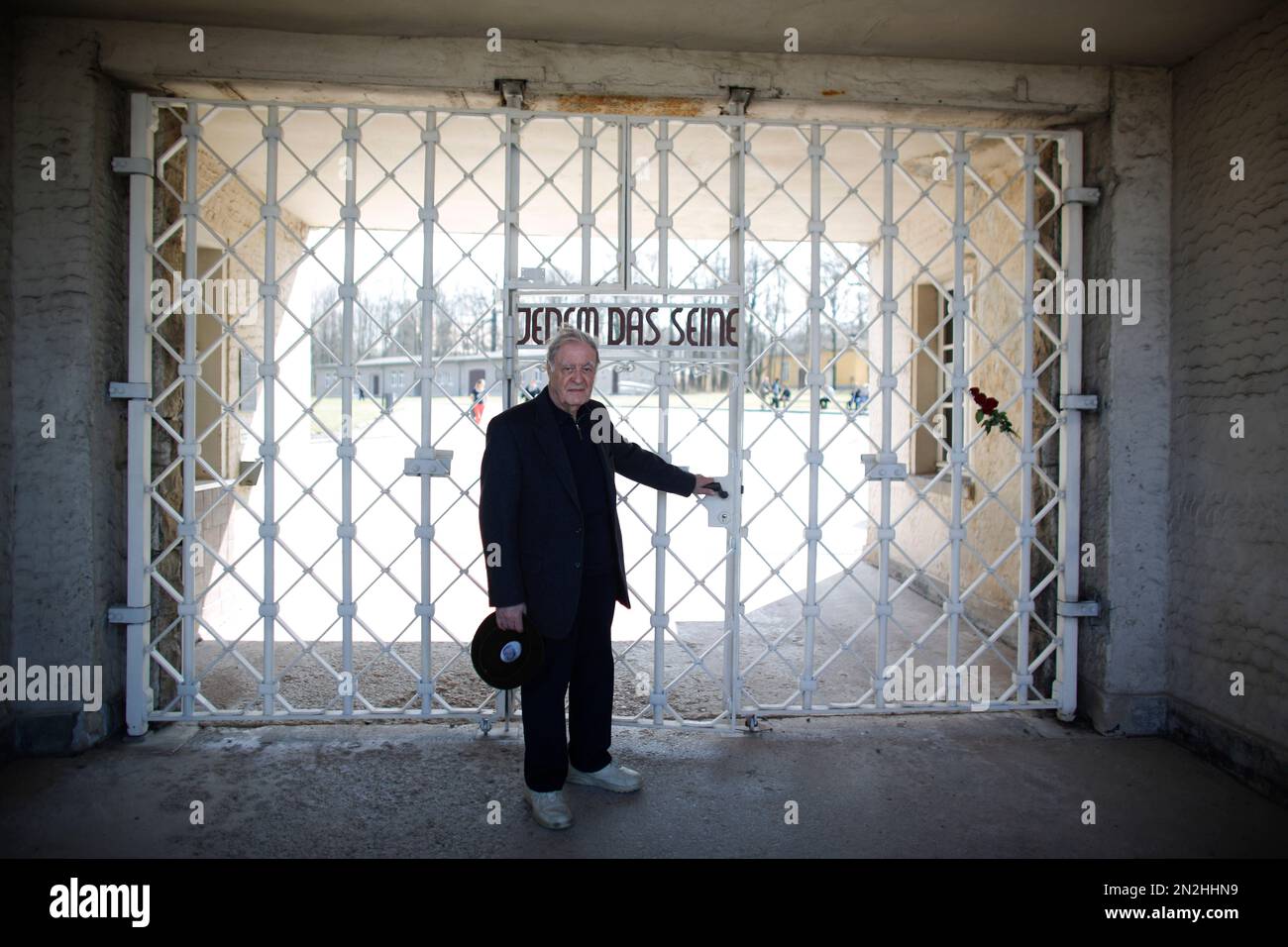 In this Friday, April 10, 2015 photo Henry Oster poses at the gate of ...