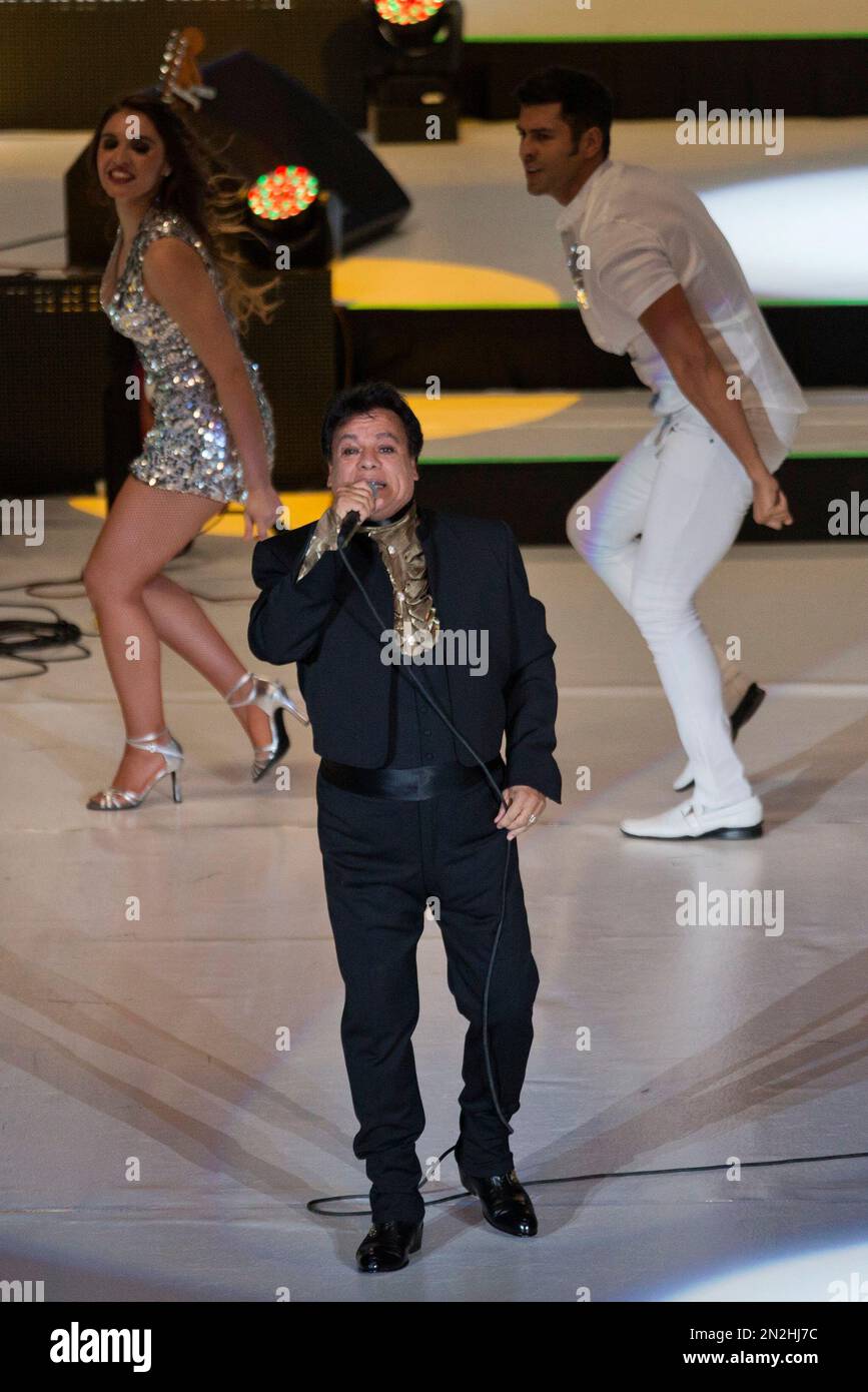 Mexican singer Juan Gabriel performs backed by dancers at the National ...