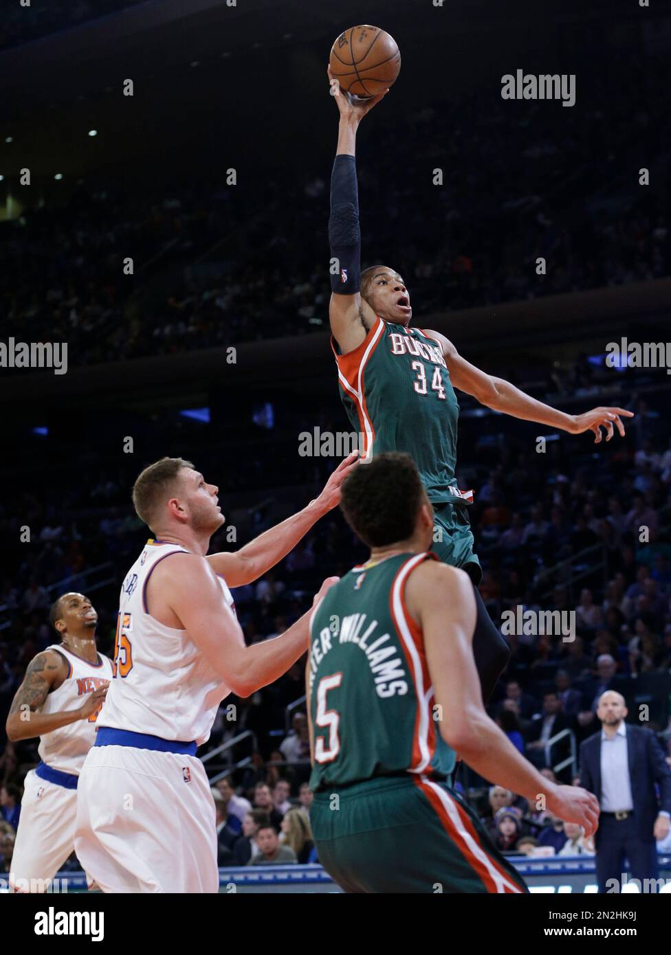 Milwaukee Bucks' Giannis Antetokounmpo (34) drives past teammate ...
