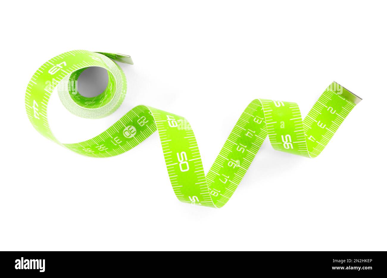 New green measuring tape isolated on white, top view Stock Photo - Alamy