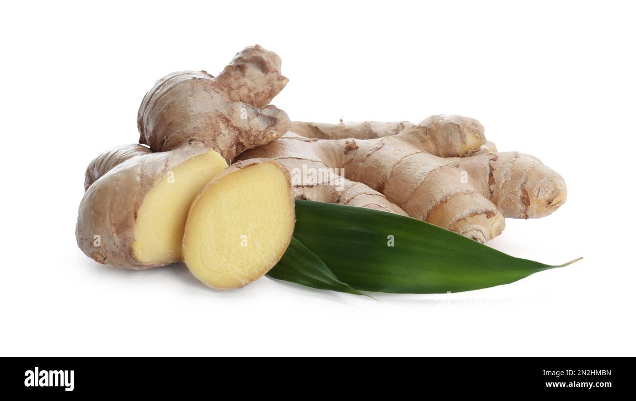 Cut fresh ginger and leaves isolated on white Stock Photo - Alamy