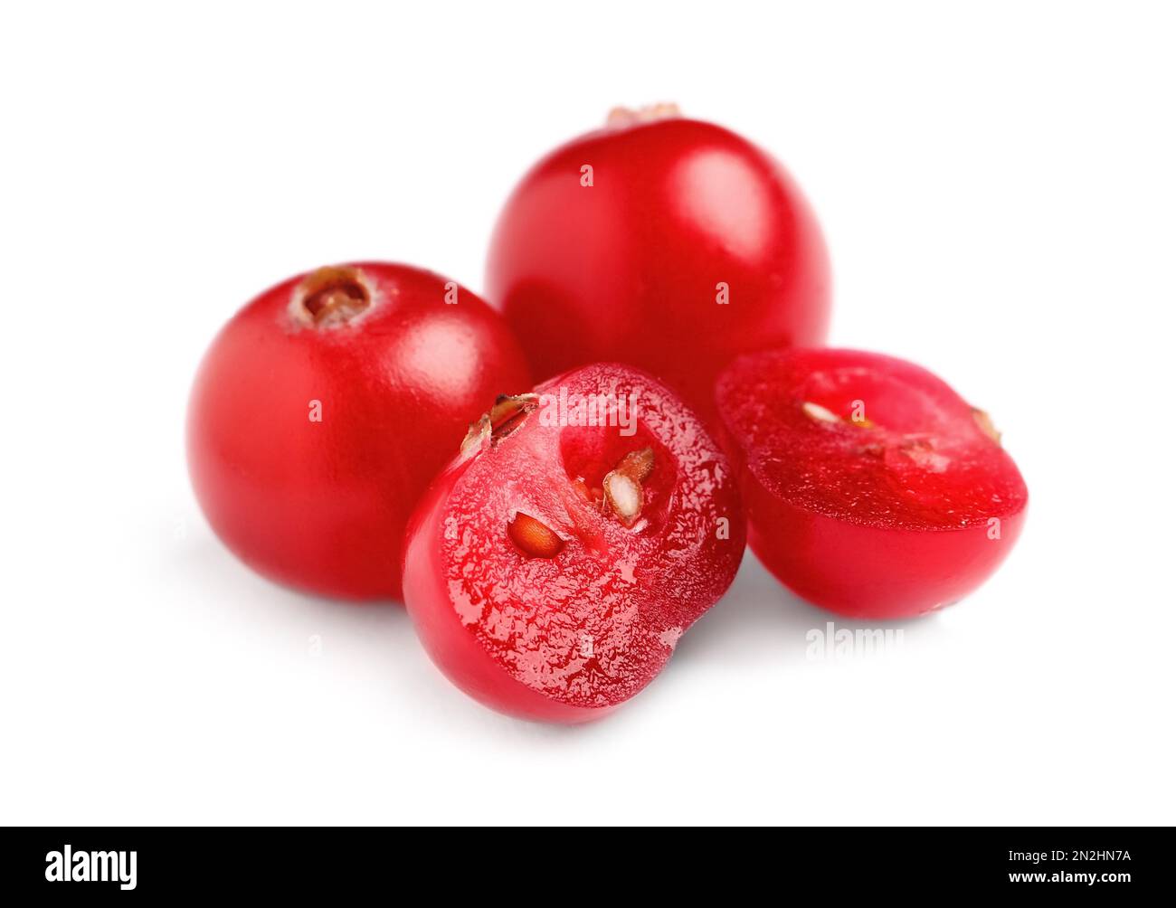 Fresh cut and whole cranberries on white background Stock Photo - Alamy