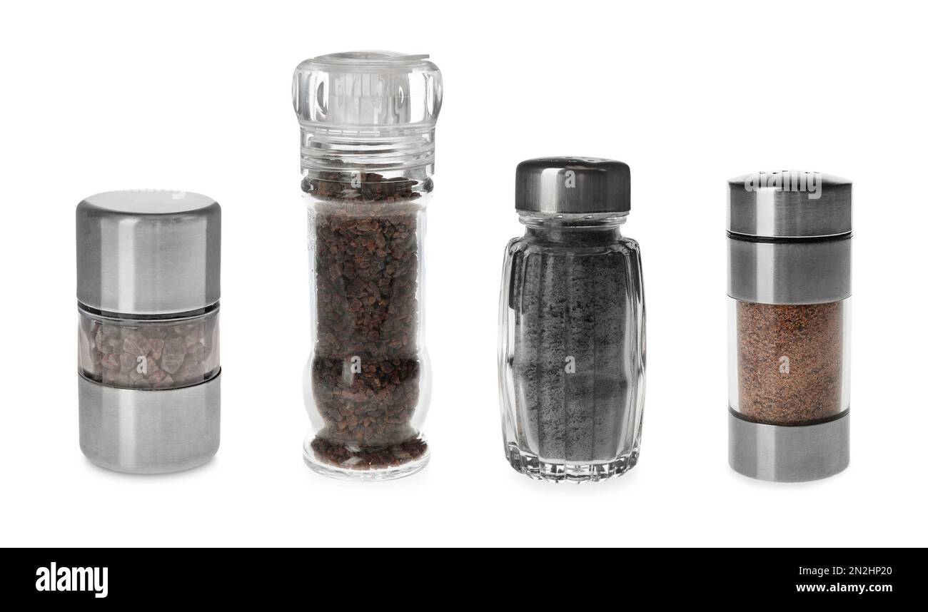 Set of shakers with black salt isolated on white Stock Photo - Alamy