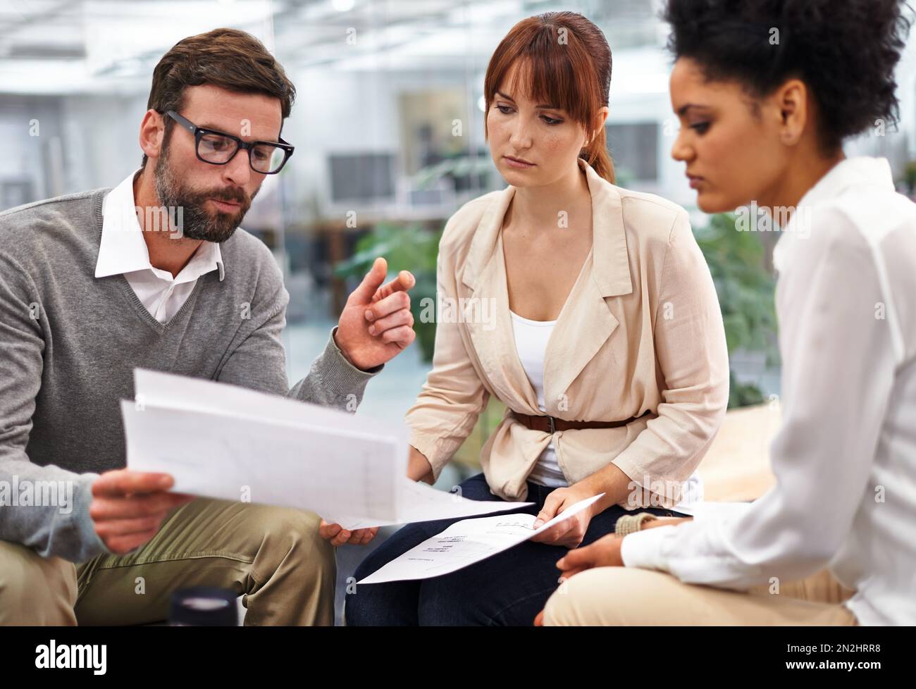 Sharing project ideas. a diverse group of young professionals ...