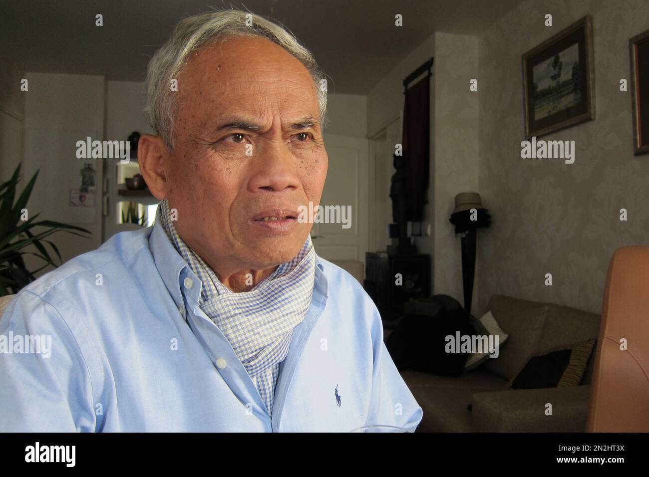In this March 18, 2015, photo, Long Botta, 72, a Cambodian member of ...