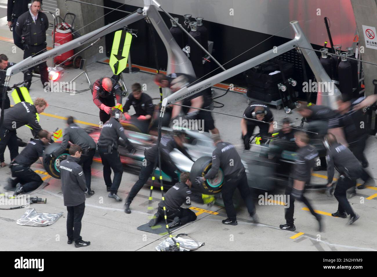 Mercedes pit crew practice for the tire change using the car of Lewis ...
