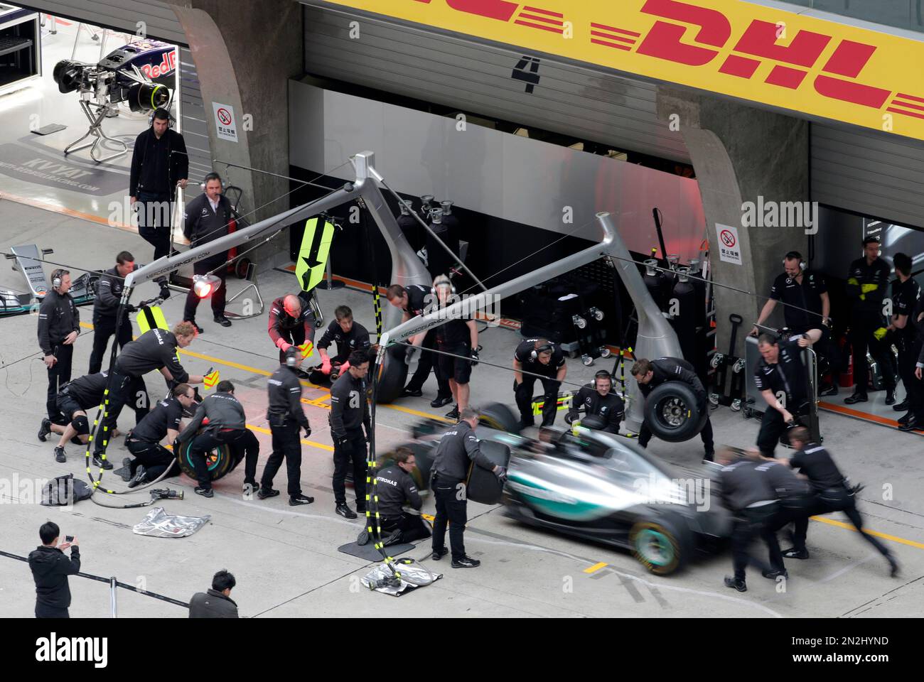 Mercedes pit crew practice for the tire change using the car of Lewis ...