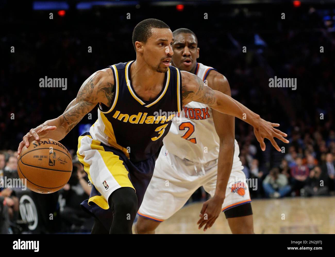 Indiana Pacers' George Hill (3) drives past New York Knicks' Langston ...