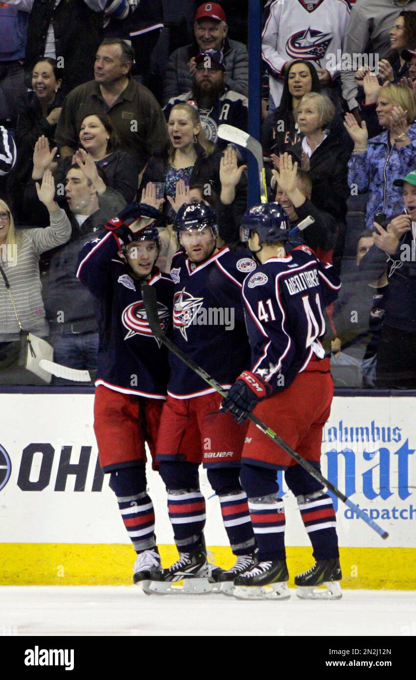 Columbus Blue Jackets' Scott Hartnell, center, celebrates his goal ...