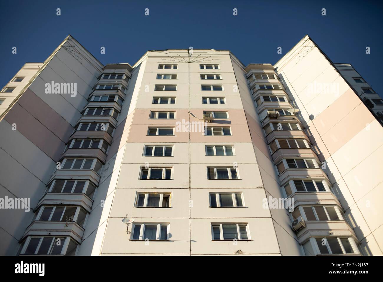 Residential building in city. Urban architecture. Lots of windows in ...