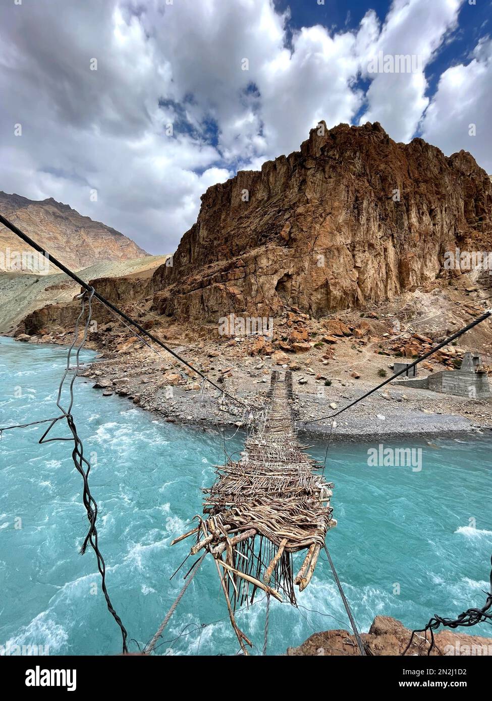 A flowing river surrounded by rocky Ladakh & Zanskar mountains Stock ...