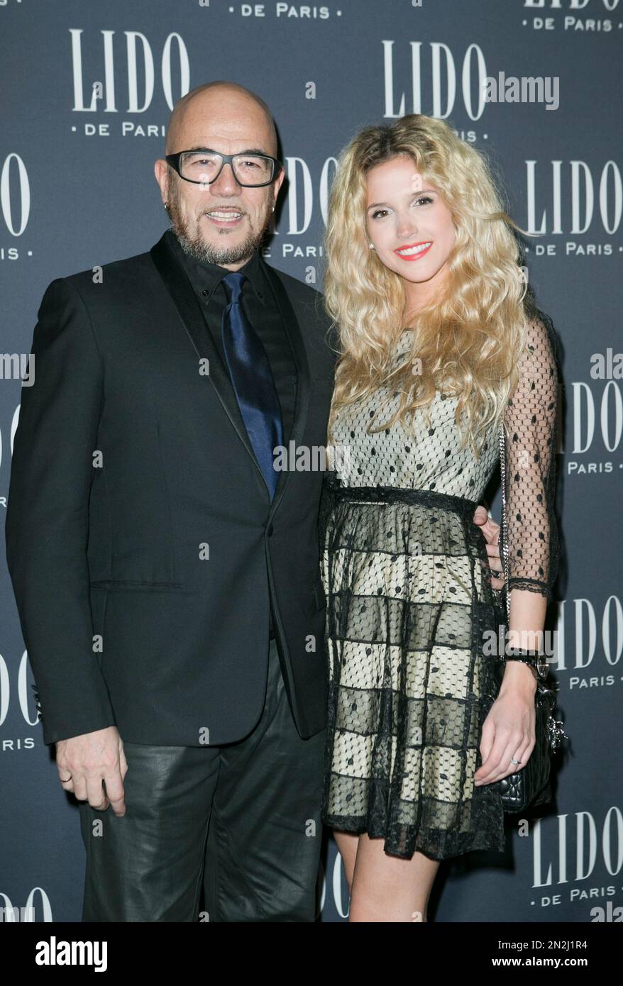 French Singer Pascal Obispo, left, and his companion Julie Hanston ...