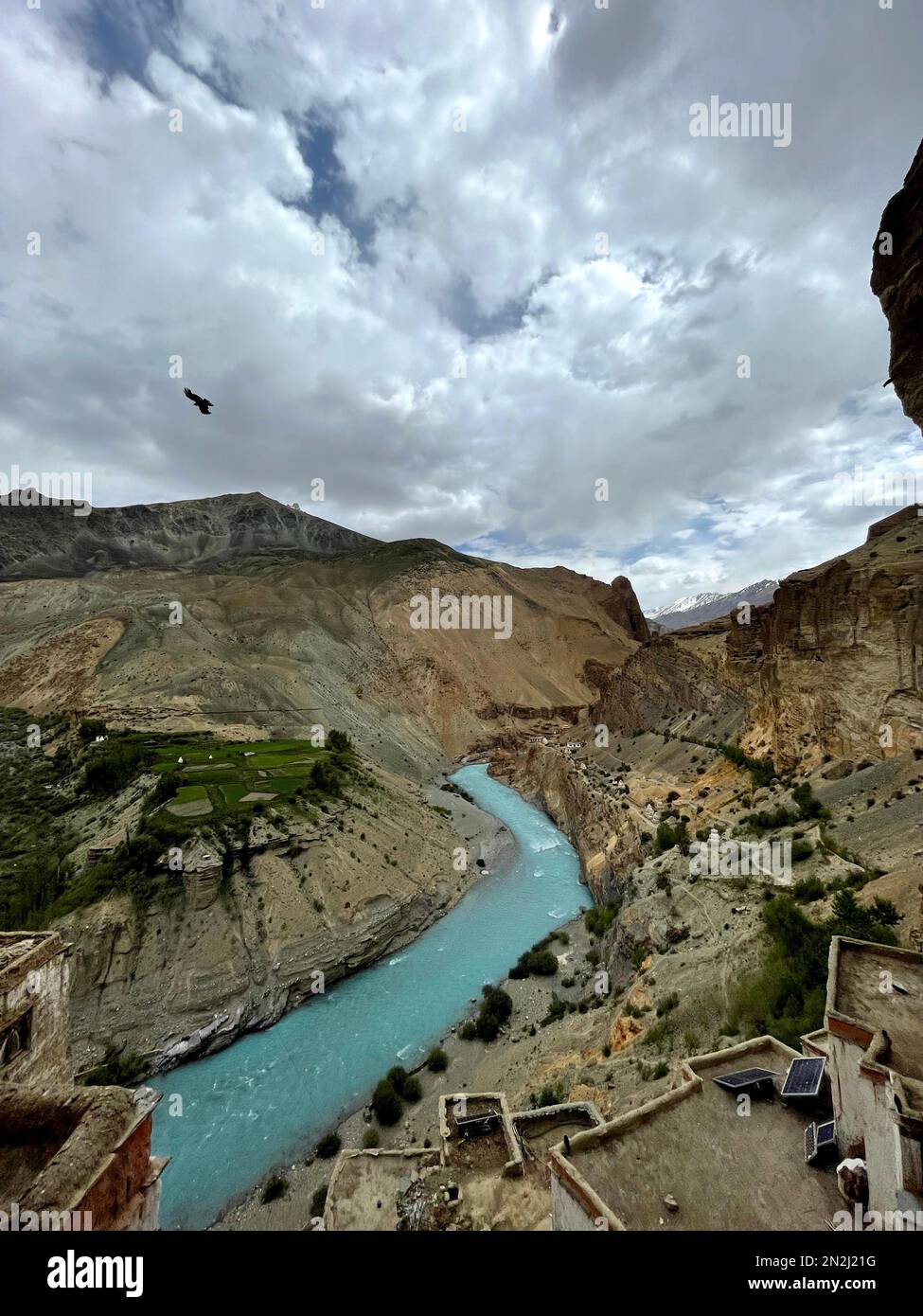 A flowing river surrounded by rocky Ladakh & Zanskar mountains Stock ...