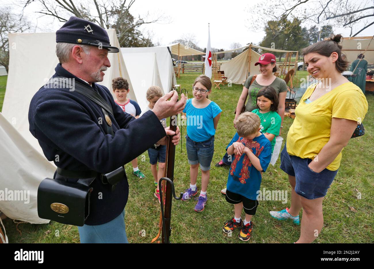 Historical interpreter Joe McShane of Kittanning Pa., shows Jeryl ...