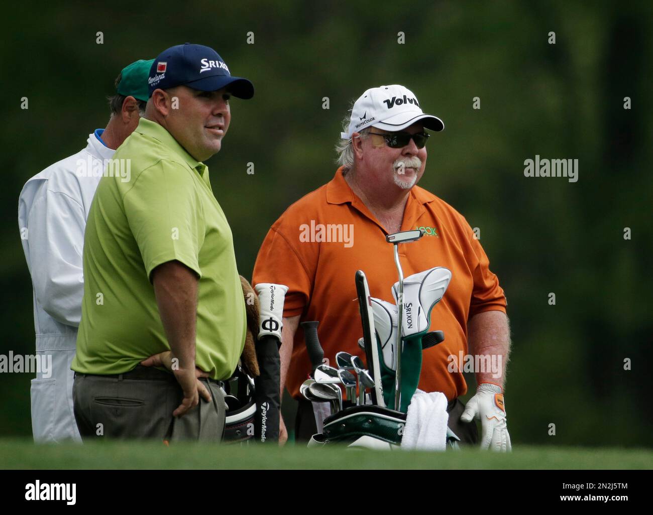 Kevin Stadler, left, stands next to his father Craig Stadler on the ...