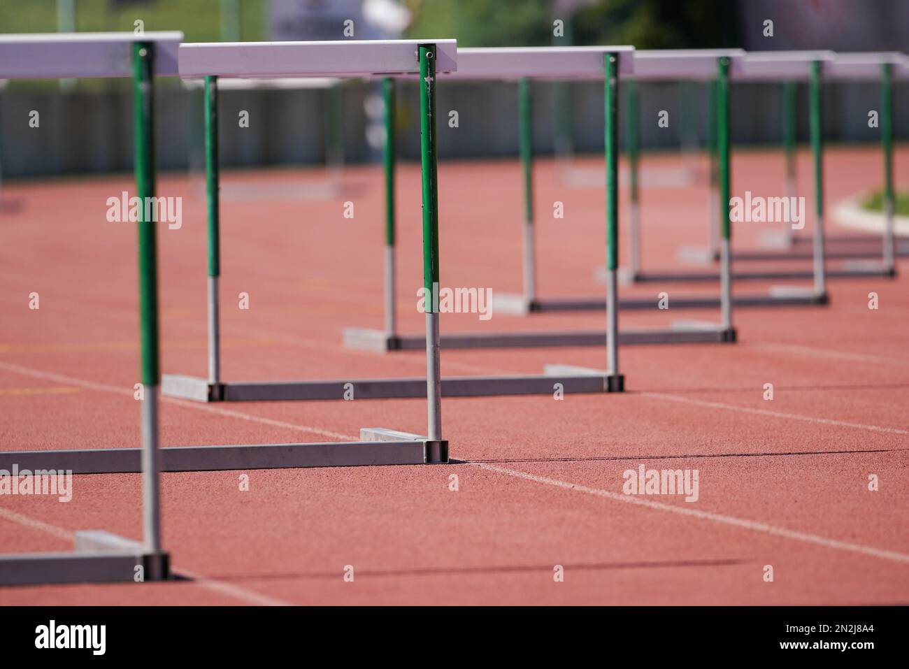 White Hurdles on a Athletics Track Stock Photo - Alamy