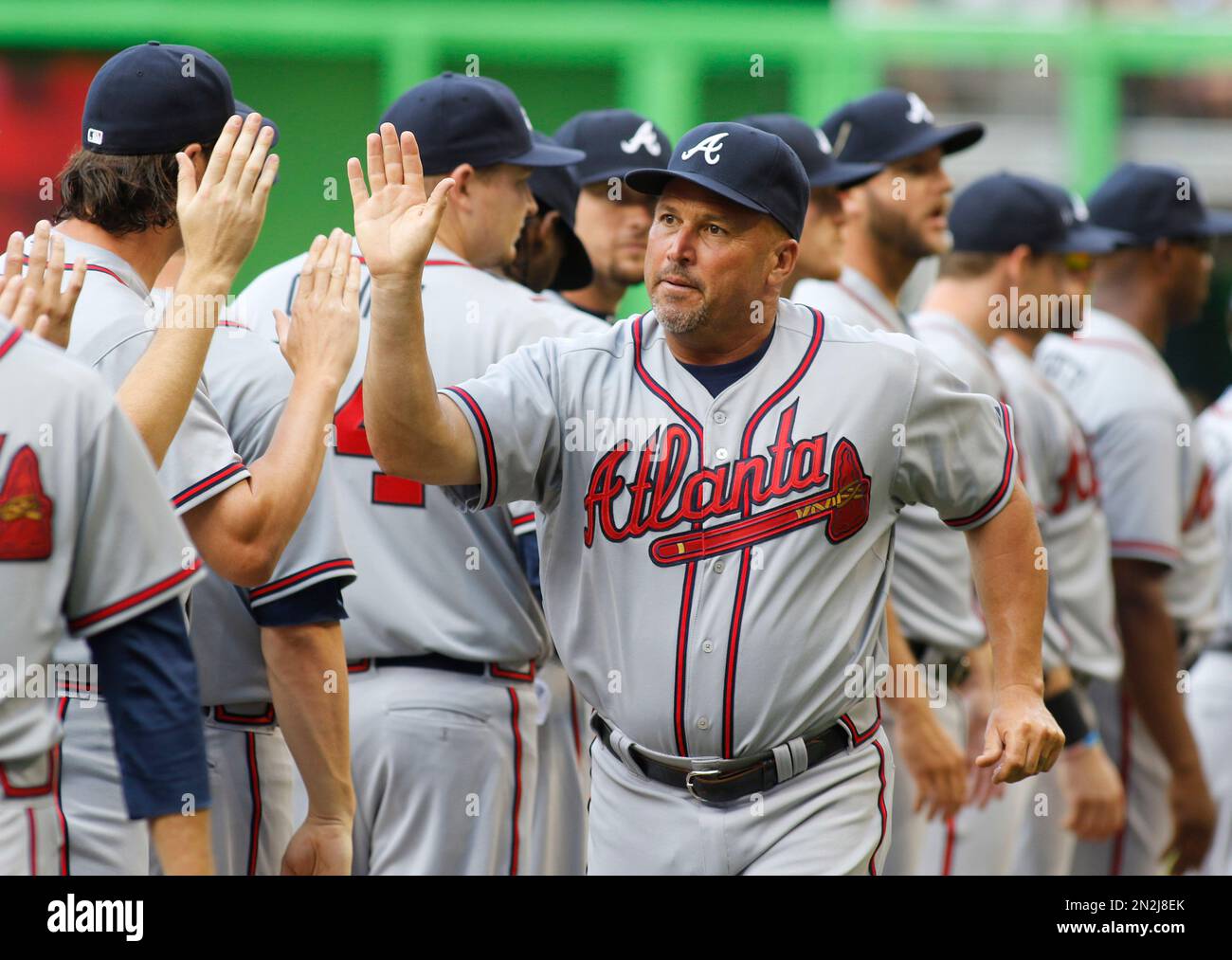 Atlanta Braves manager Fredi Gonzalez greets his players during ...