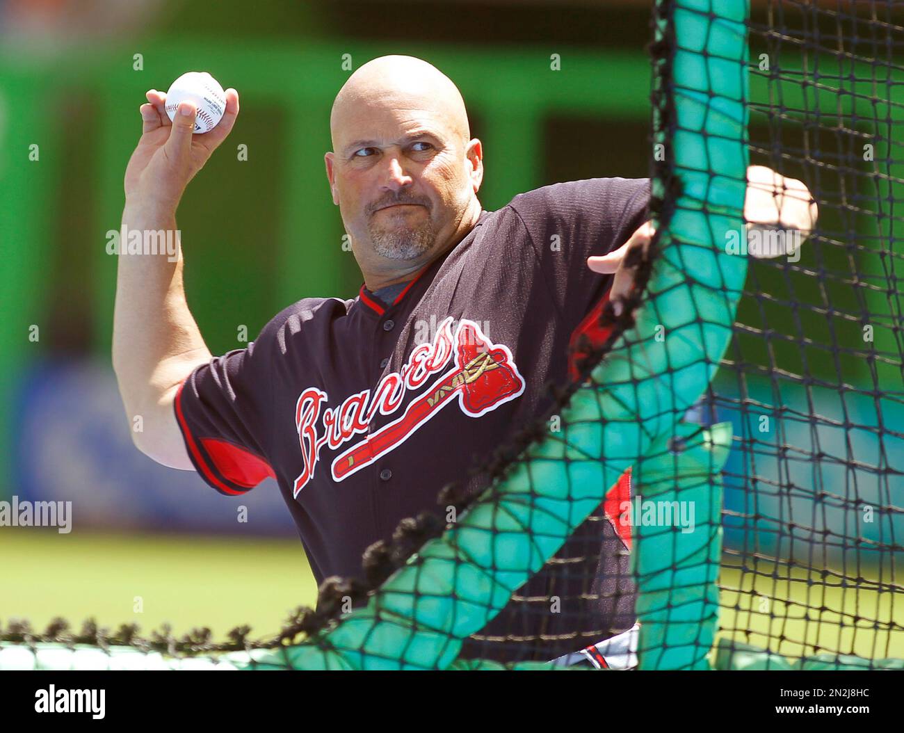 Atlanta Braves manager Fredi Gonzalez throws batting practice before ...