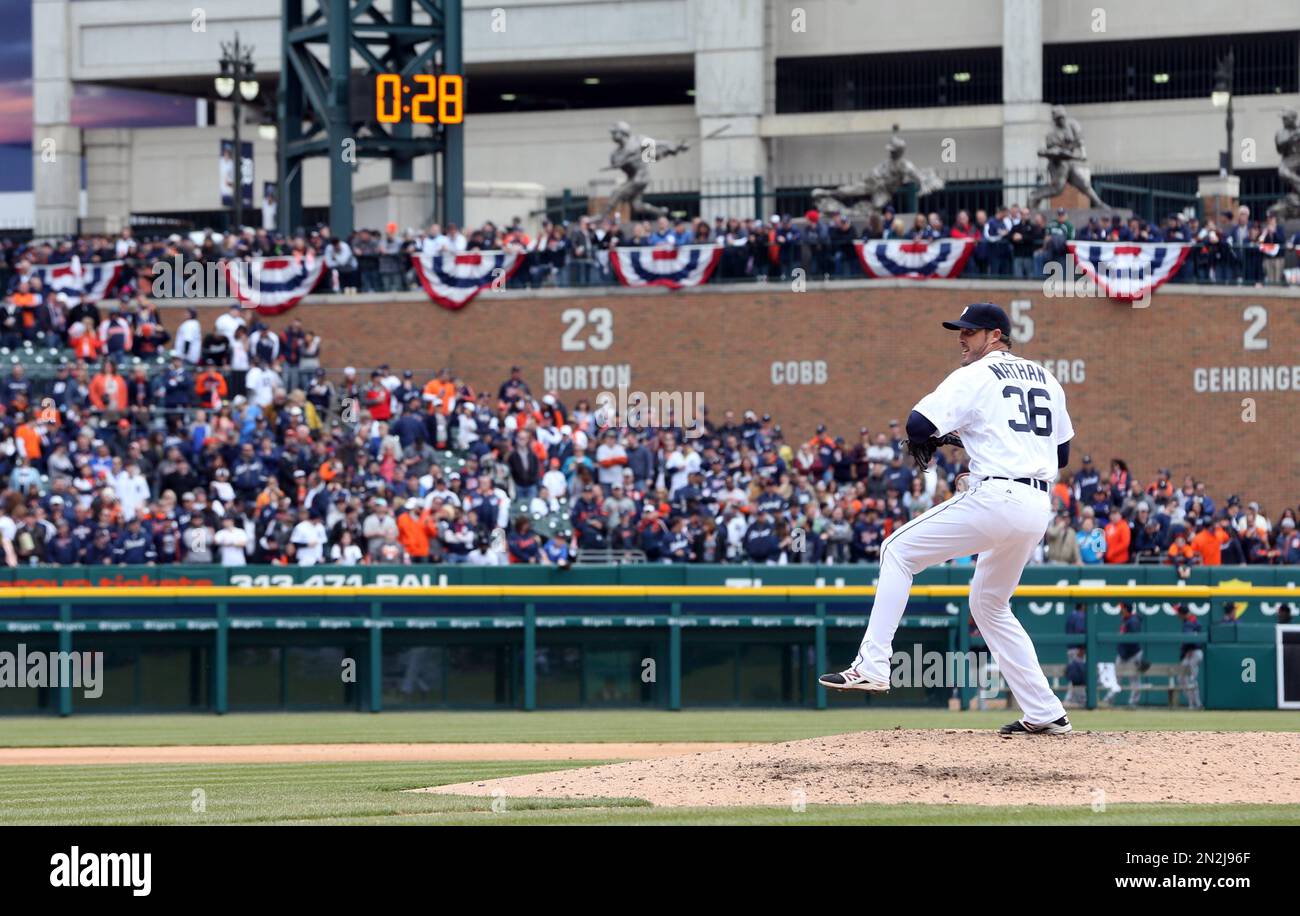 Detroit Tigers relief pitcher Joe Nathan throws warmup pitches as the ...