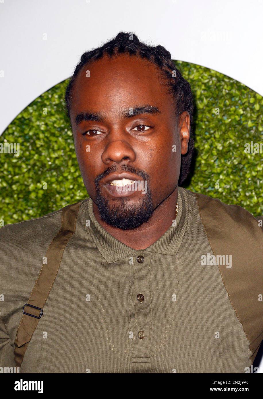 FILE - In this Dec. 4, 2014 file photo, rapper Wale attends the 2014 GQ ...
