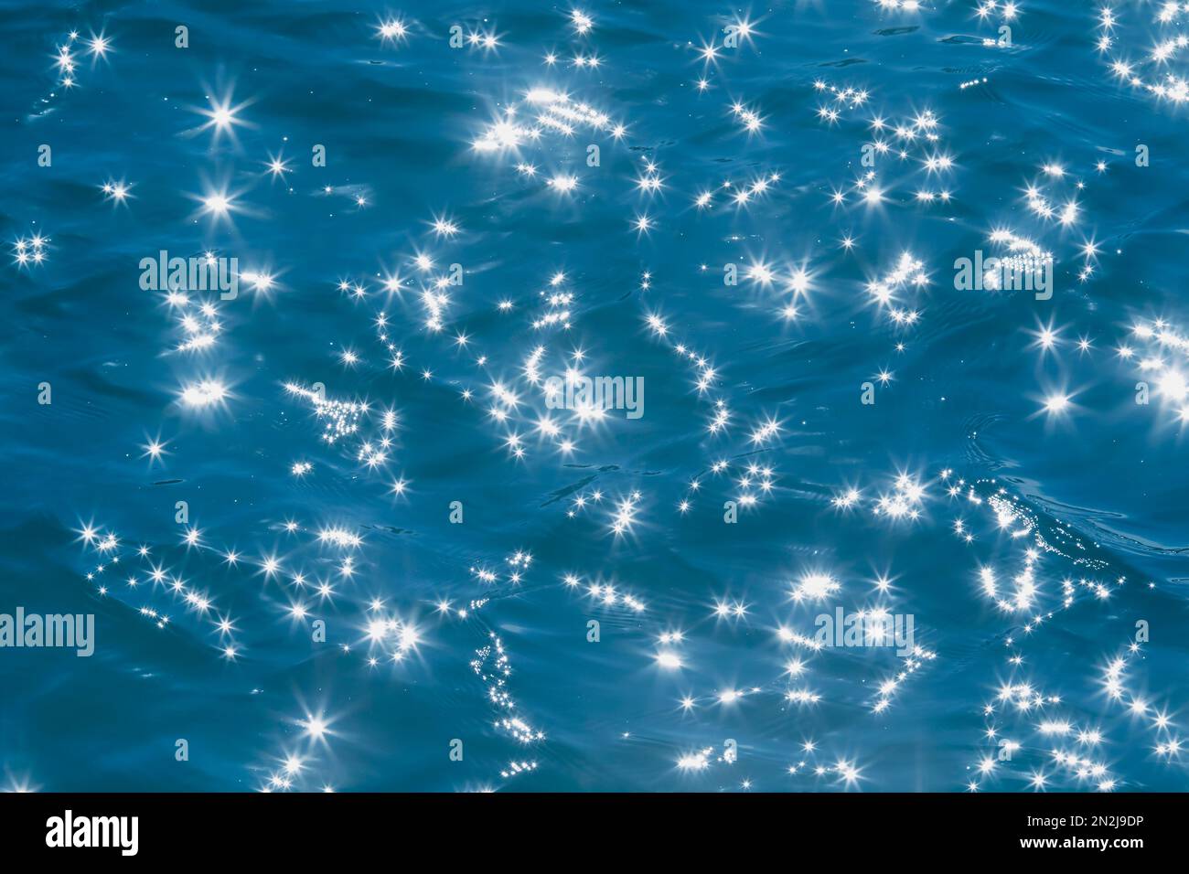 abstract natural background: sunshine in azure sea waves Stock Photo ...