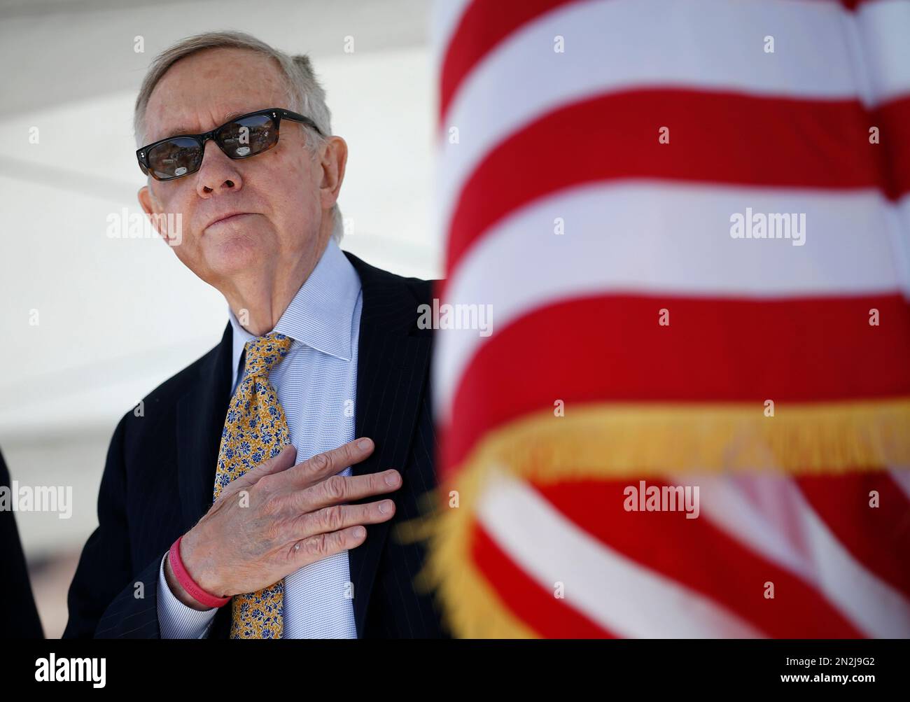 Senate Minority Leader Harry Reid, D-Nev., listens to the national ...