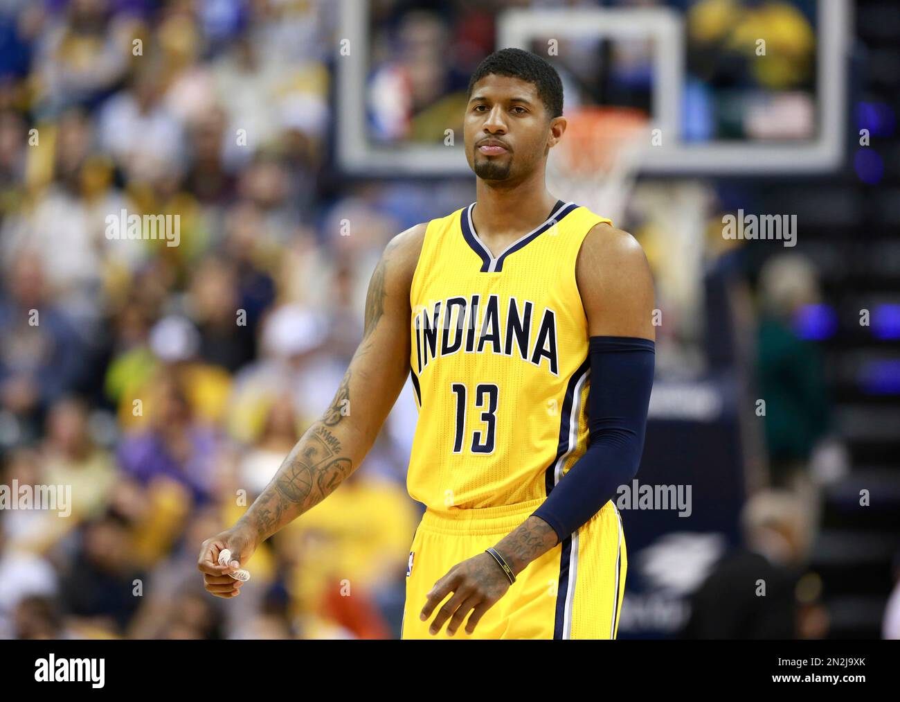 Indiana Pacers forward Paul George stands on the court during a break ...