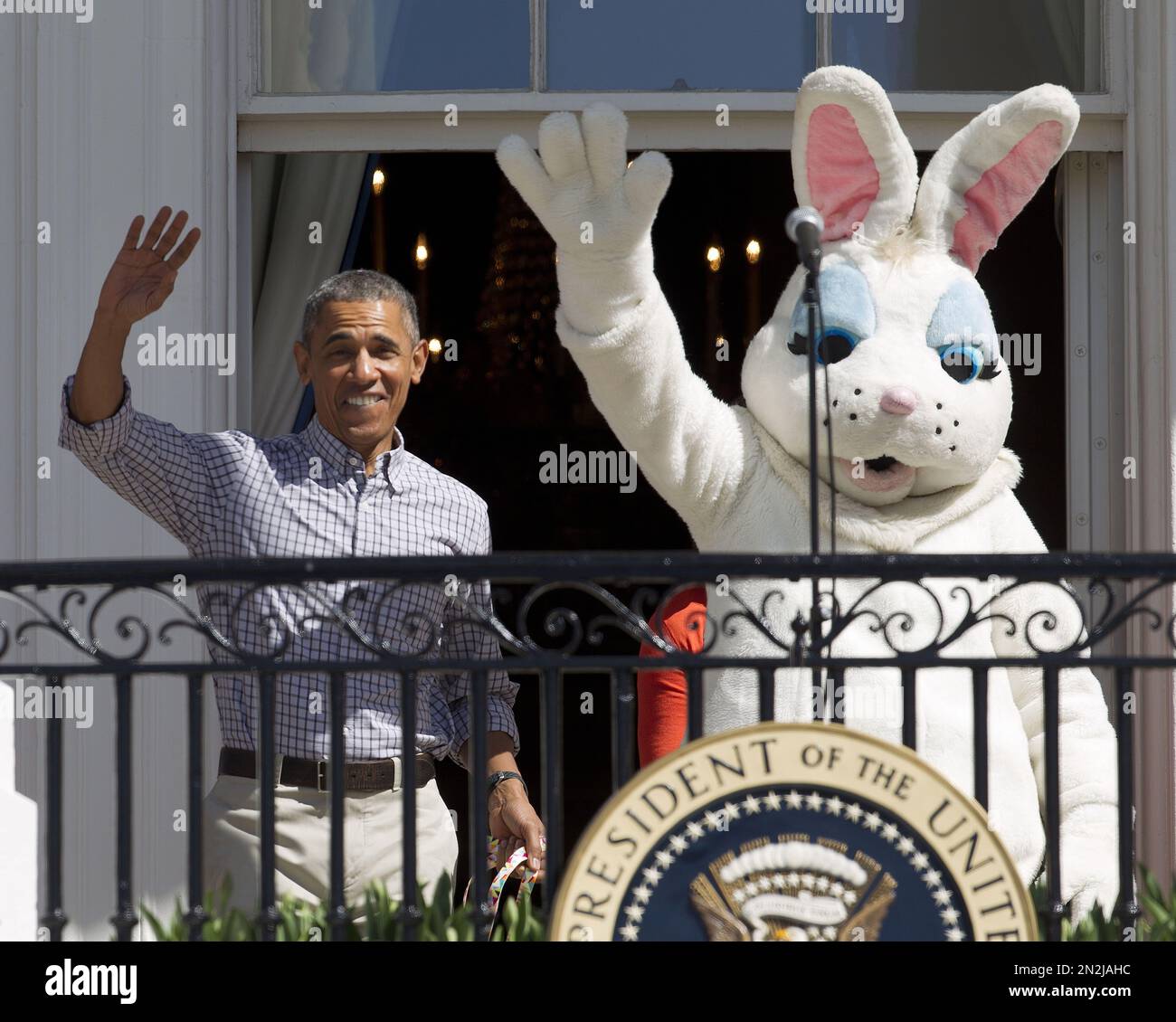President Barack Obama walks out and waves with the Easter Bunny on the ...