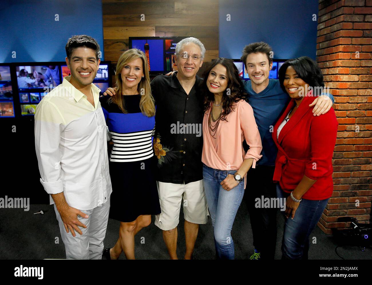 In this March 31, 2015 photo, from left, co-host Nick Calderon, co-host ...