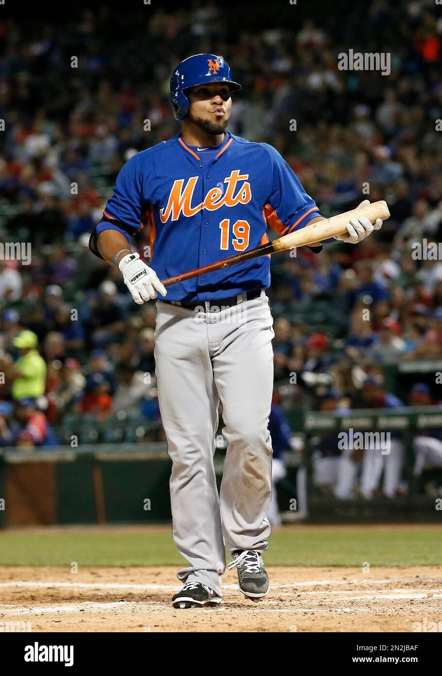 New York Mets' Johnny Monell walks back to the dugout after striking ...