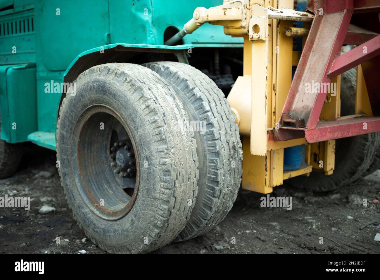 Heavy machinery. Old freight transport. Big wheels of car. Load lift ...